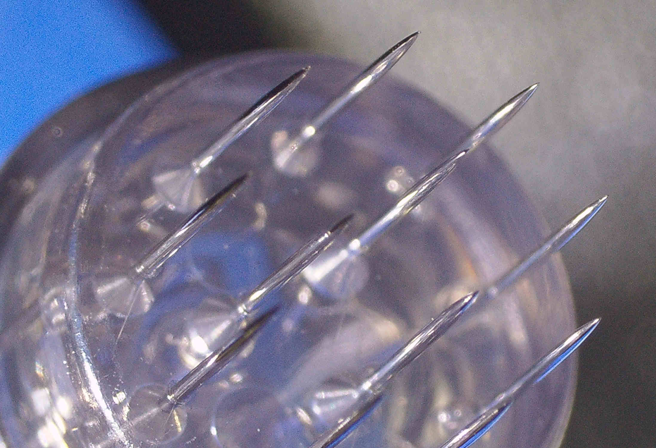 Dermaneedling instruments that permanently scar the skin